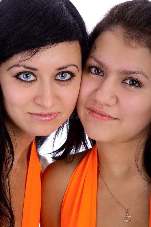 Models in orange dresses stock photo. Image of hair, women - 12854962