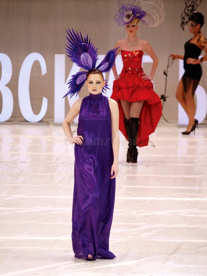 Models on podium editorial stock image. Image of bonnet - 13557179