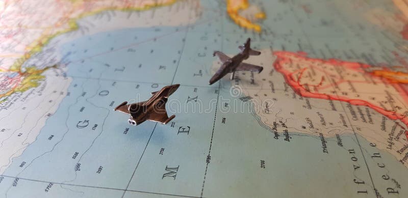 Silver Fighter Jets Above an Ancient Map of the World Stock Photo ...