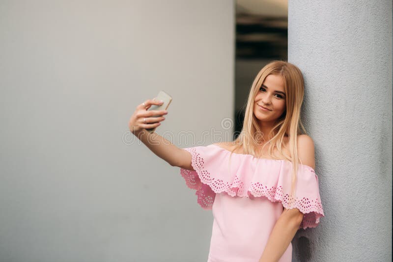 Models Walk Around the City and Use Gadgets. Sunny Day. Summer. Stock ...