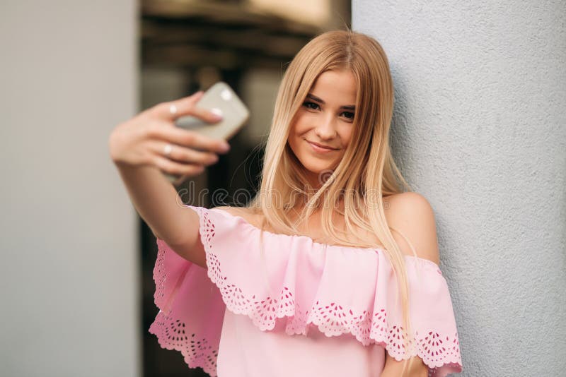 Models Walk Around the City and Use Gadgets. Sunny Day. Summer. Stock ...