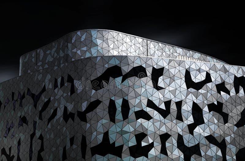 Modern Abstract Building with Silver and Blue Patterns and a Dark ...