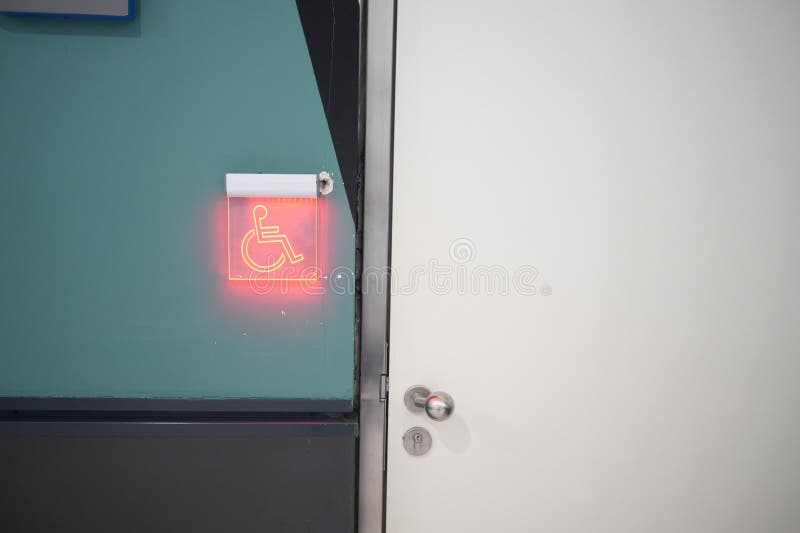 Modern and Accessible Restroom Signage Featuring an Illuminating Red ...