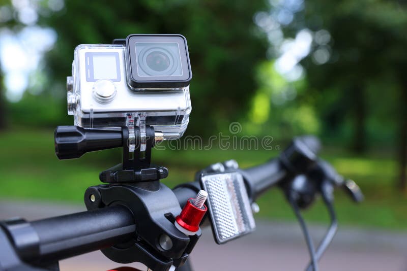 Modern Action Camera with Mount on Bicycle Outdoors, Closeup Stock ...