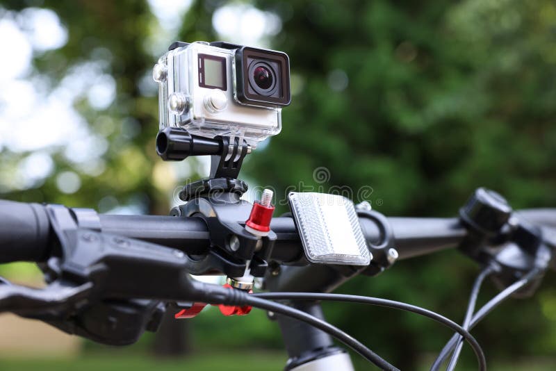 Modern Action Camera with Mount on Bicycle Outdoors, Closeup Stock ...