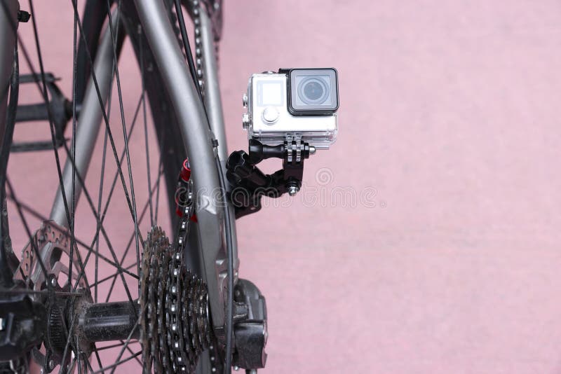 Modern Action Camera with Mount on Bicycle Outdoors. Space for Text ...