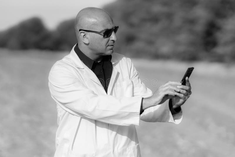 Agronomist at work stock image. Image of garden, botany - 126008161