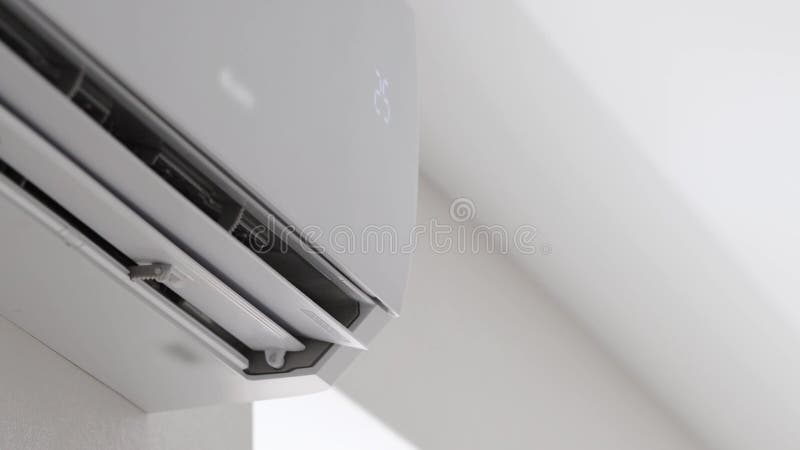 Modern Air Conditioner in the Office with Movable Shutters. Cooling and ...