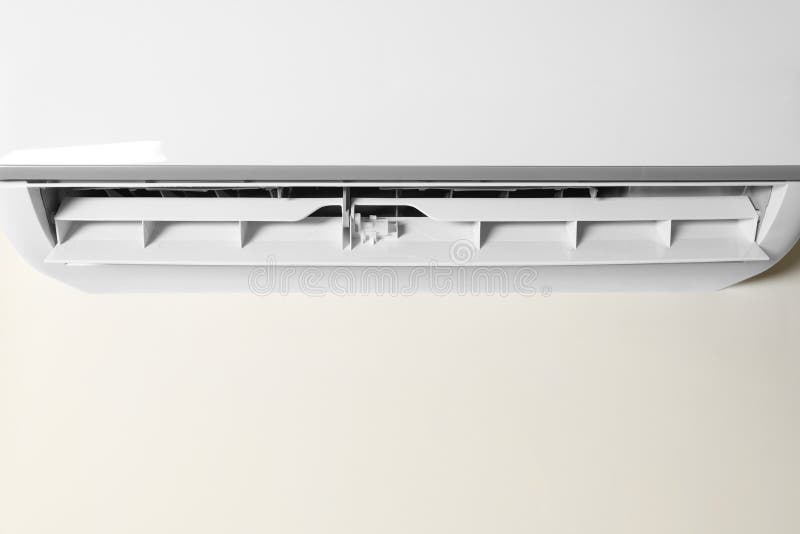 Modern Air Conditioner on White Wall, Closeup View Stock Photo - Image ...