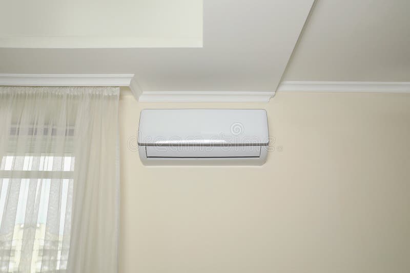 Modern Air Conditioner on White Wall Indoors Stock Image - Image of ...