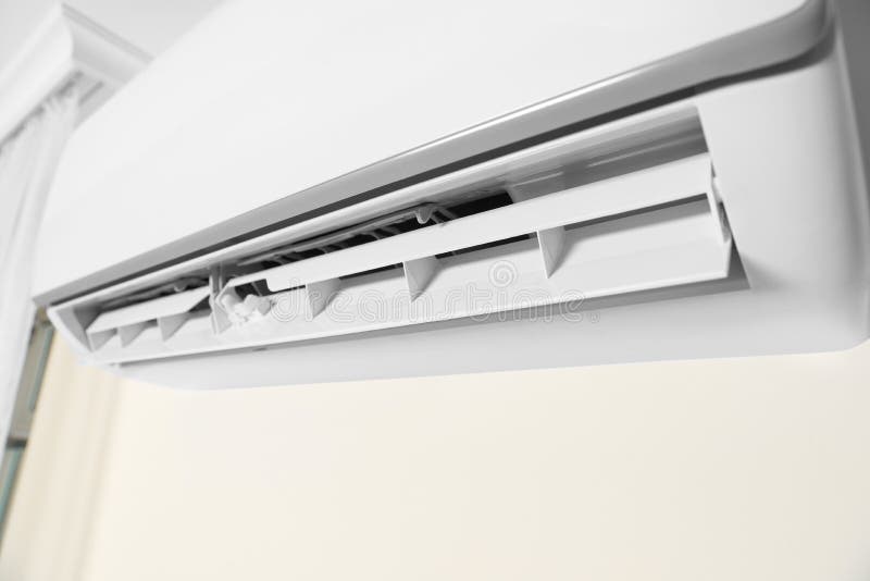 Modern Air Conditioner on White Wall Indoors, Closeup View Stock Photo ...