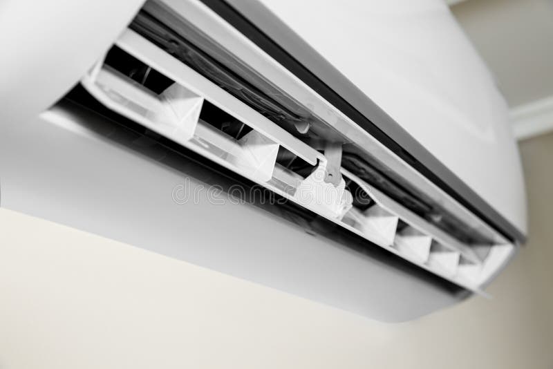 Modern Air Conditioner on White Wall Indoors, Closeup View Stock Photo ...