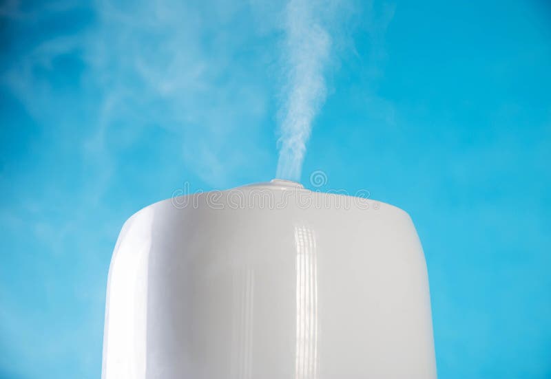 Modern Air Humidifier on a Blue Background. Humidification in the Room ...