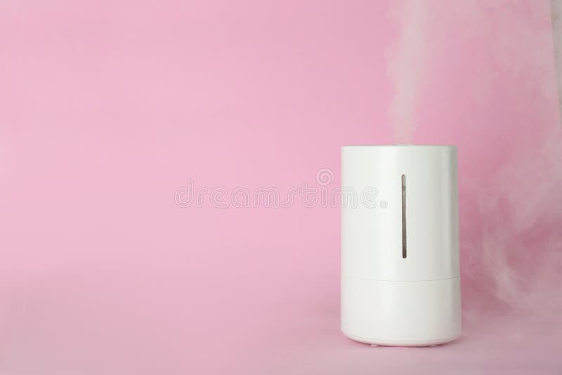 Air Humidifier on Pink Background. Space for Text Stock Photo - Image ...