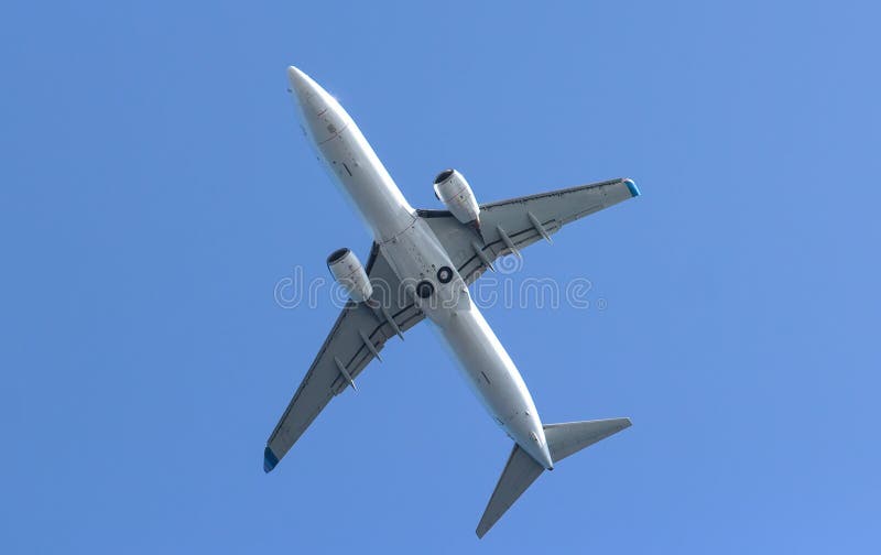 Modern Airplane at Takeoff Seen from the Bottom Stock Photo - Image of ...