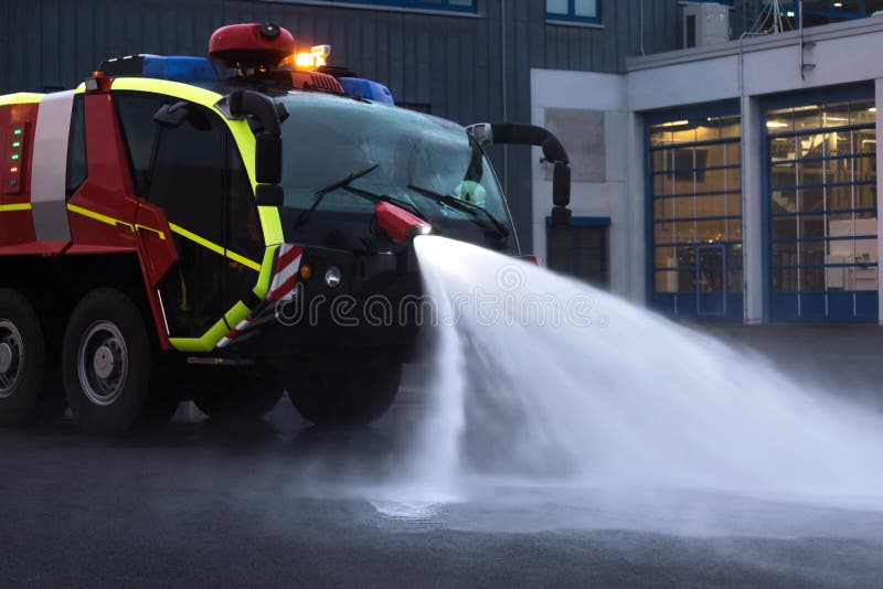 Modern Airport Fire Department Fire Engine Clears with Water Stock ...