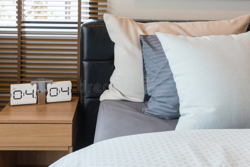 Modern Alarm Clock on Wooden Table Side in Modern Bedroom Stock Image ...