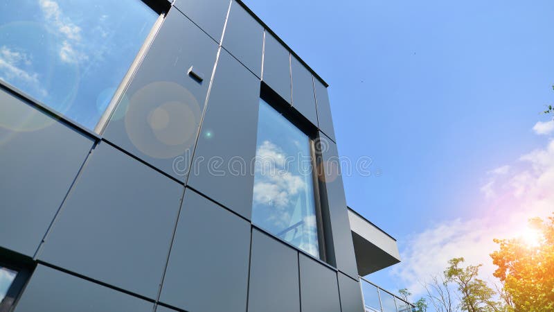 Graphite Facade and Large Windows on a Fragment of an Office Building ...