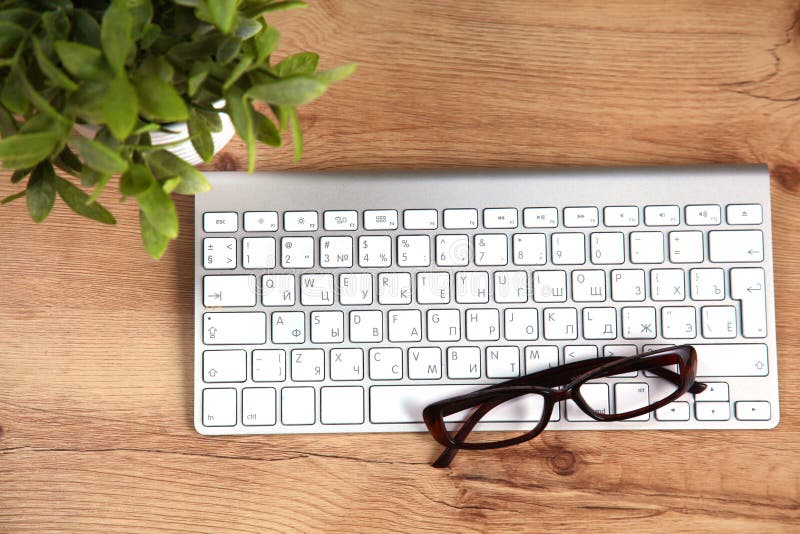 Modern Aluminum Computer Keyboard on the Table Stock Photo - Image of ...