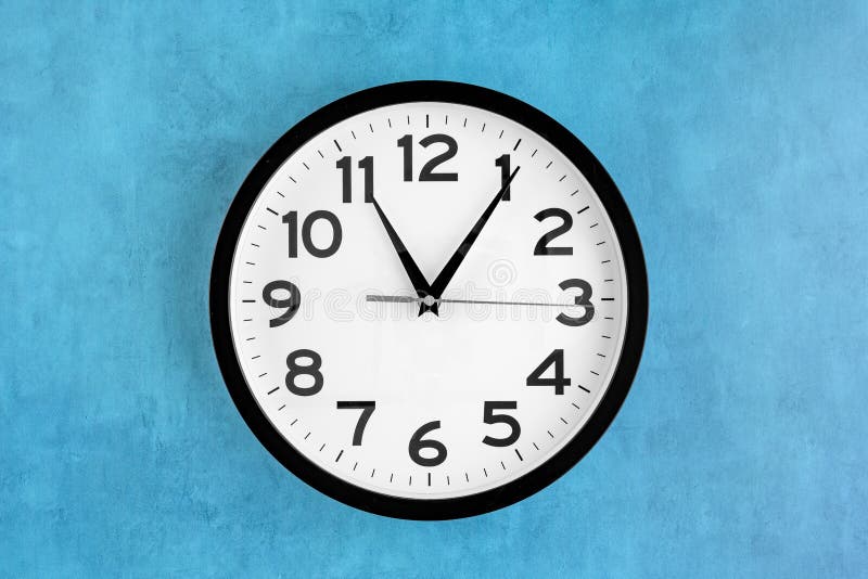 Modern Analog Clock, Round in Black and White, on a Blue Background ...