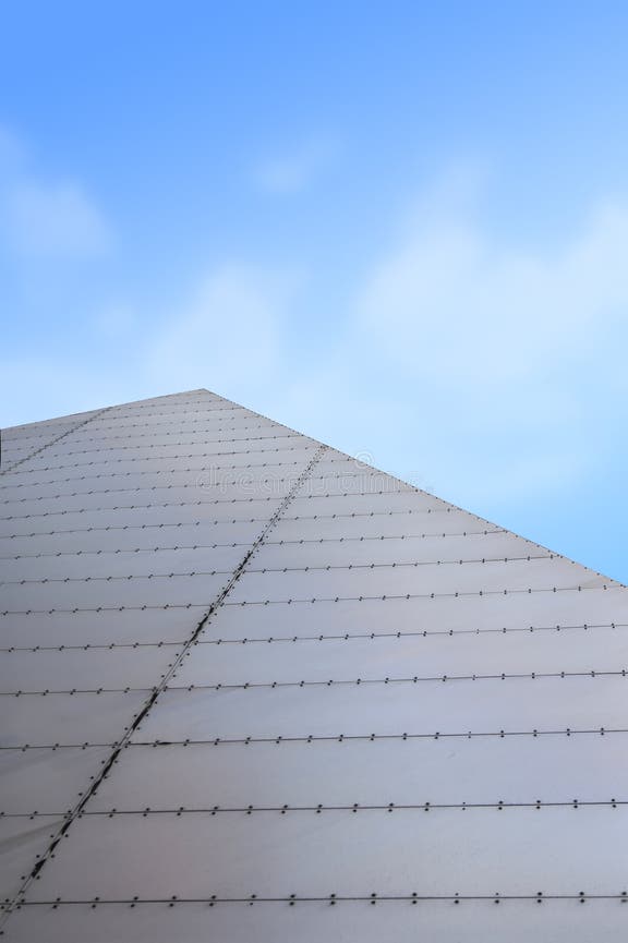 Modern Angular Metal Building Structure with Blue Sky Background Stock ...