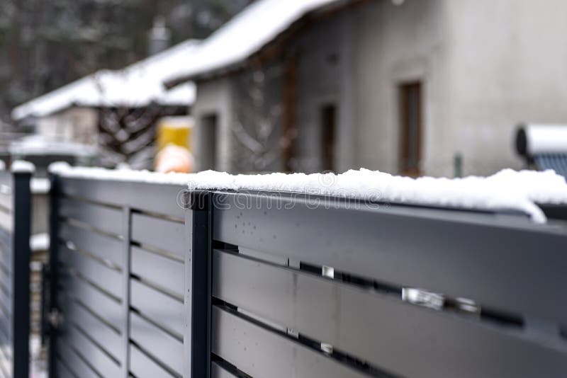 Modern Anthracite Panel Fence with Falling Snow, Visible Sliding Gate ...