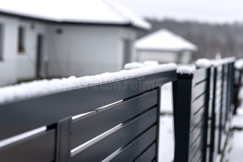 Modern Anthracite Panel Fence with Falling Snow, Visible Sliding Gate ...
