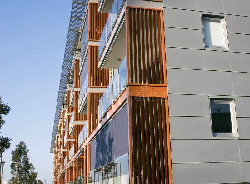 Modern Apartment Block Exterior Stock Image - Image of orange, design ...