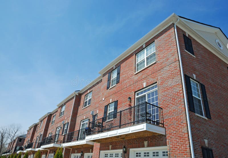 Row of apartment buildings stock photo. Image of construction - 15433684