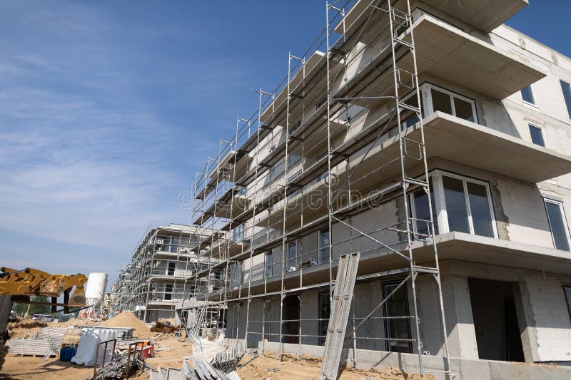 A Modern Apartment Building Currently Under Construction, Complete with ...