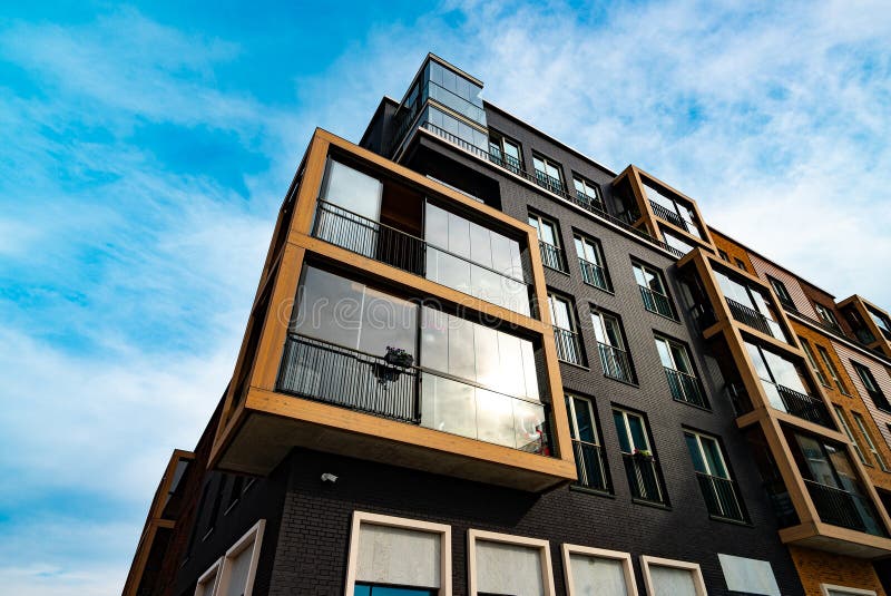 Modern Apartment Building with Glass Balconies Stock Image - Image of ...