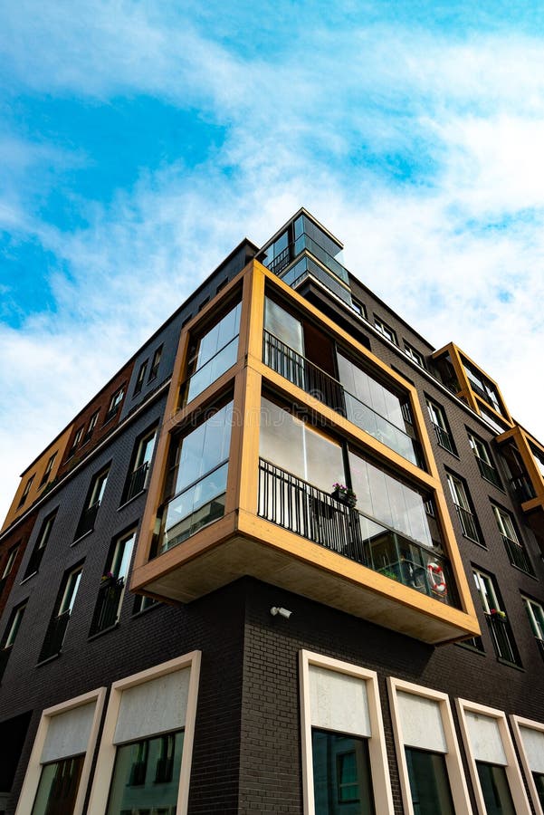 Modern Apartment Building with Glass Balconies Stock Photo - Image of ...