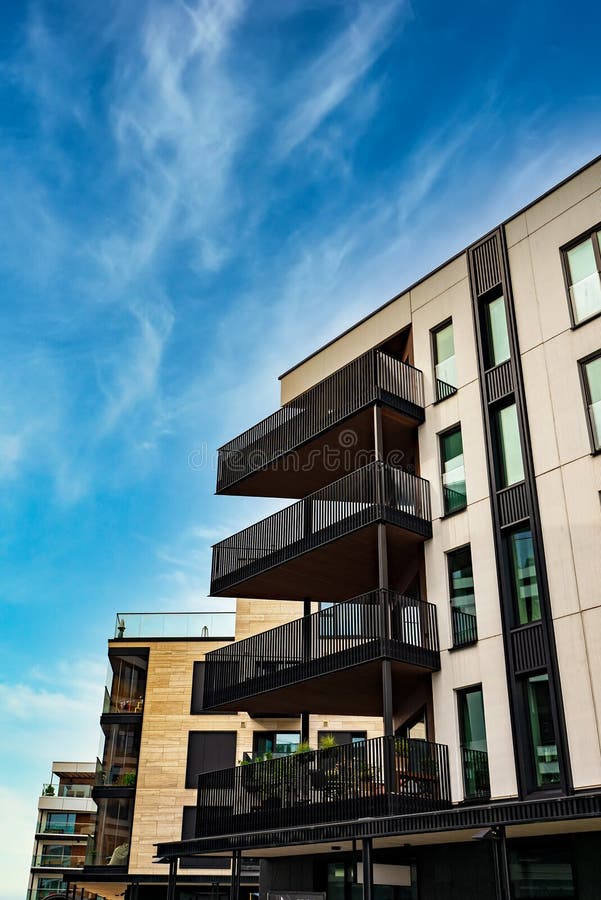 Modern Apartment Building with Glass Balconies Stock Photo - Image of ...