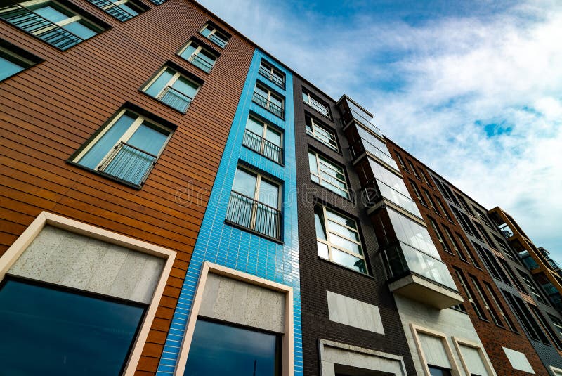 Modern Apartment Building with Glass Balconies Stock Image - Image of ...