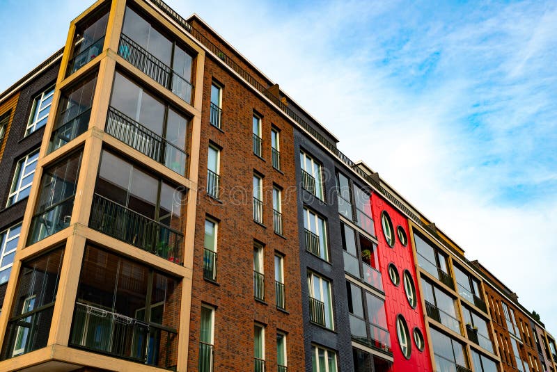 Modern Apartment Building with Glass Balconies Stock Photo - Image of ...