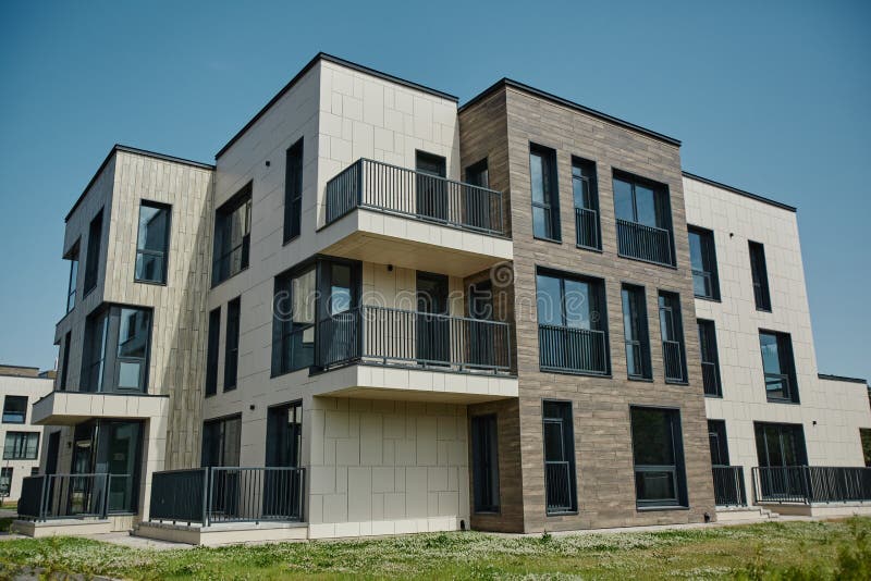 Modern Apartment Building in Housing Complex Lit by Sunlight Stock ...