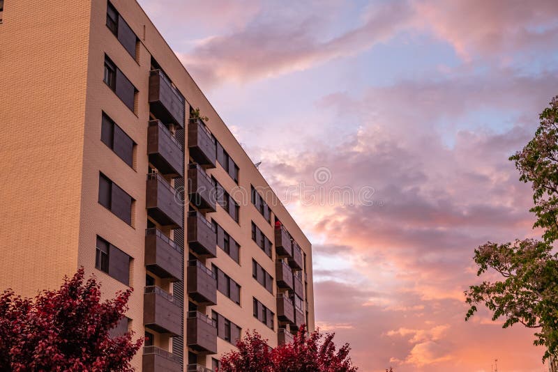 Modern Apartment Building on a Sunset Stock Image - Image of innovative ...