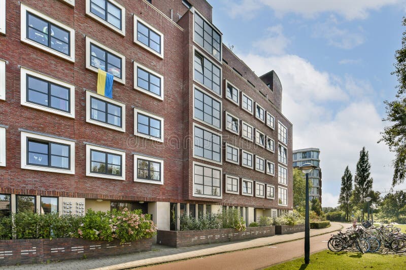 Modern Apartment Building in Urban Setting Stock Image - Image of ...