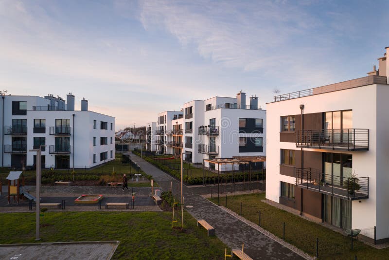 Modern Apartment Complex with Shared Outdoor Space Stock Image - Image ...