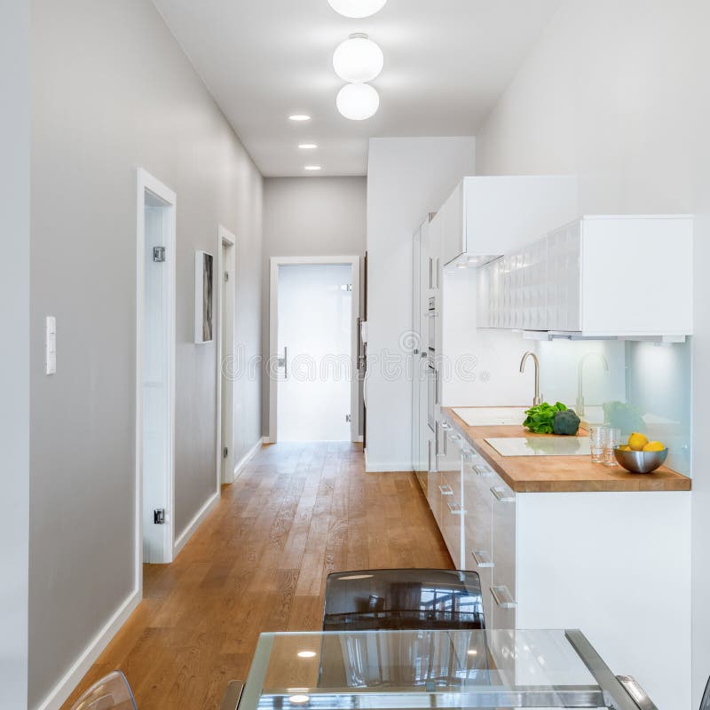 Kitchen area in corridor stock image. Image of design - 207575347