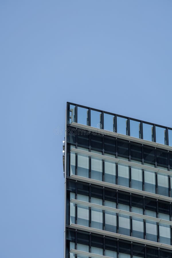 Modern Architectural Building Against a Clear Blue Sky Stock Photo ...