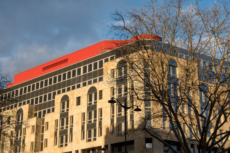Modern Architectural Building with Red Accents in Urban Setting Stock ...