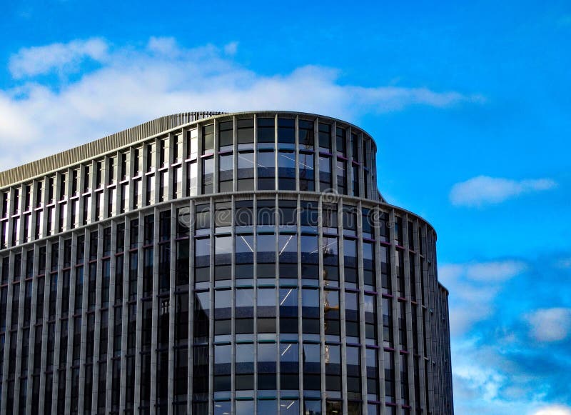 Modern Architectural Building Under a Blue Sky Stock Photo - Image of ...