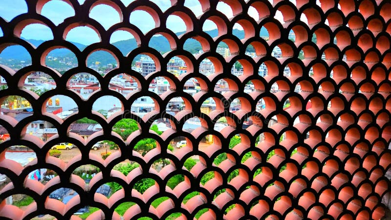 Modern Architectural Design Features a Patterned Wall Overlooking a ...