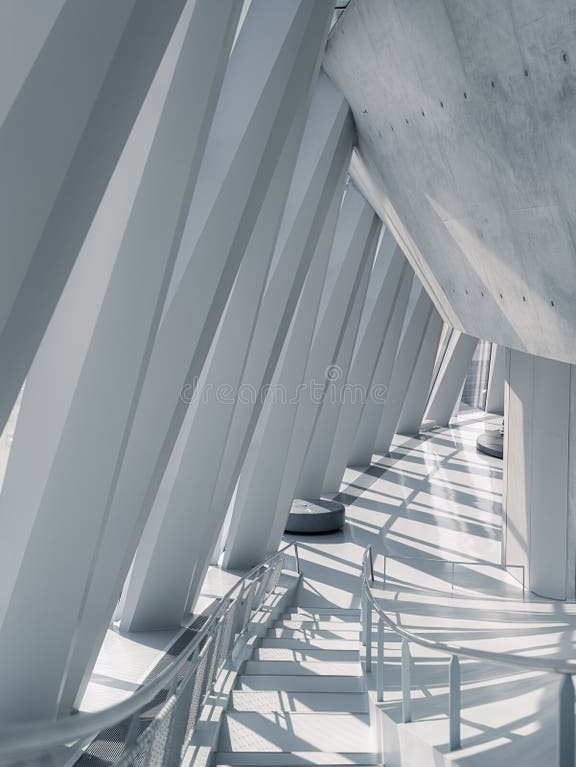 Modern Architectural Design Featuring Angled Beams and Smooth Surfaces ...