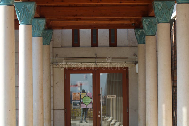 Modern Architectural Design Featuring Distinctive Columns and Entryway ...