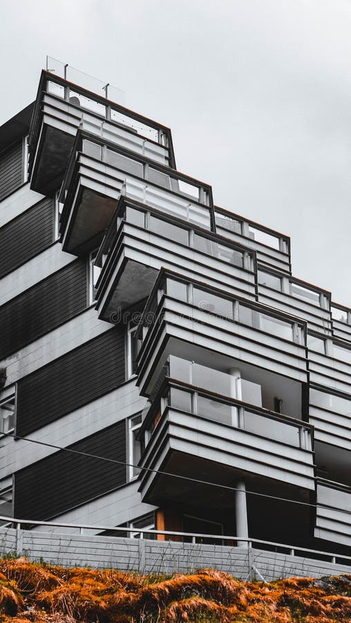 Modern Architectural Structure Features a Top Floor with Striking Black ...