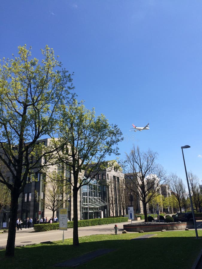 Modern Architecture and Airplane in Pleasant Environment Stock Image ...