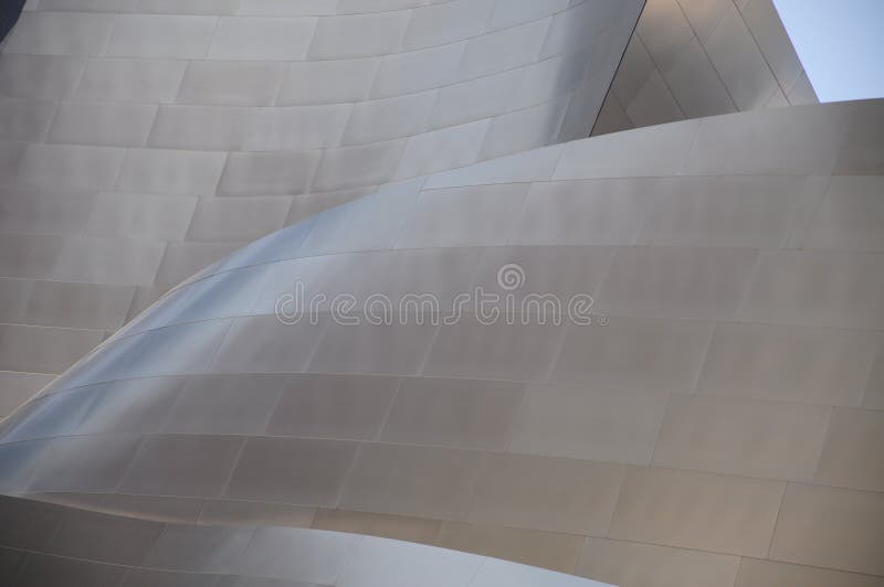 Modern Architecture with Curving Metallic Surfaces Reflecting Sunlight ...