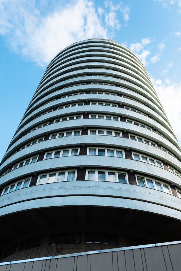 Modern Architecture of a Round Building with Concrete Rings Around the ...